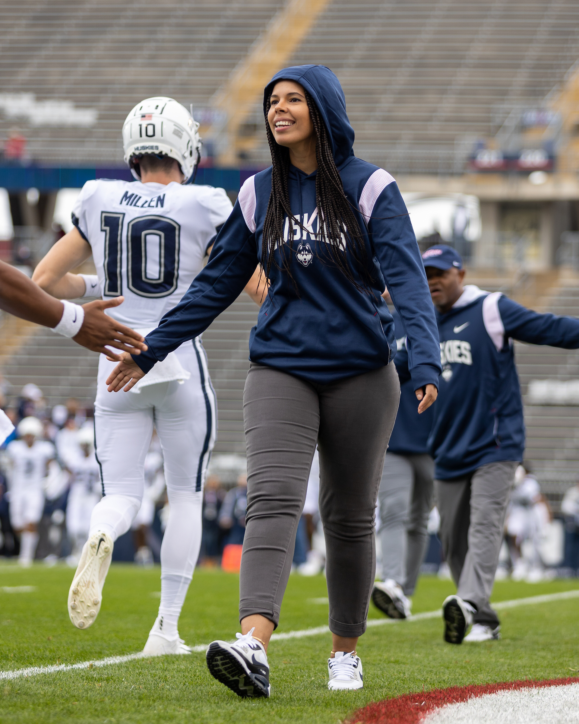 Mickey Grace Embraces Her Role on UConn Football Coaching Staff - UConn ...